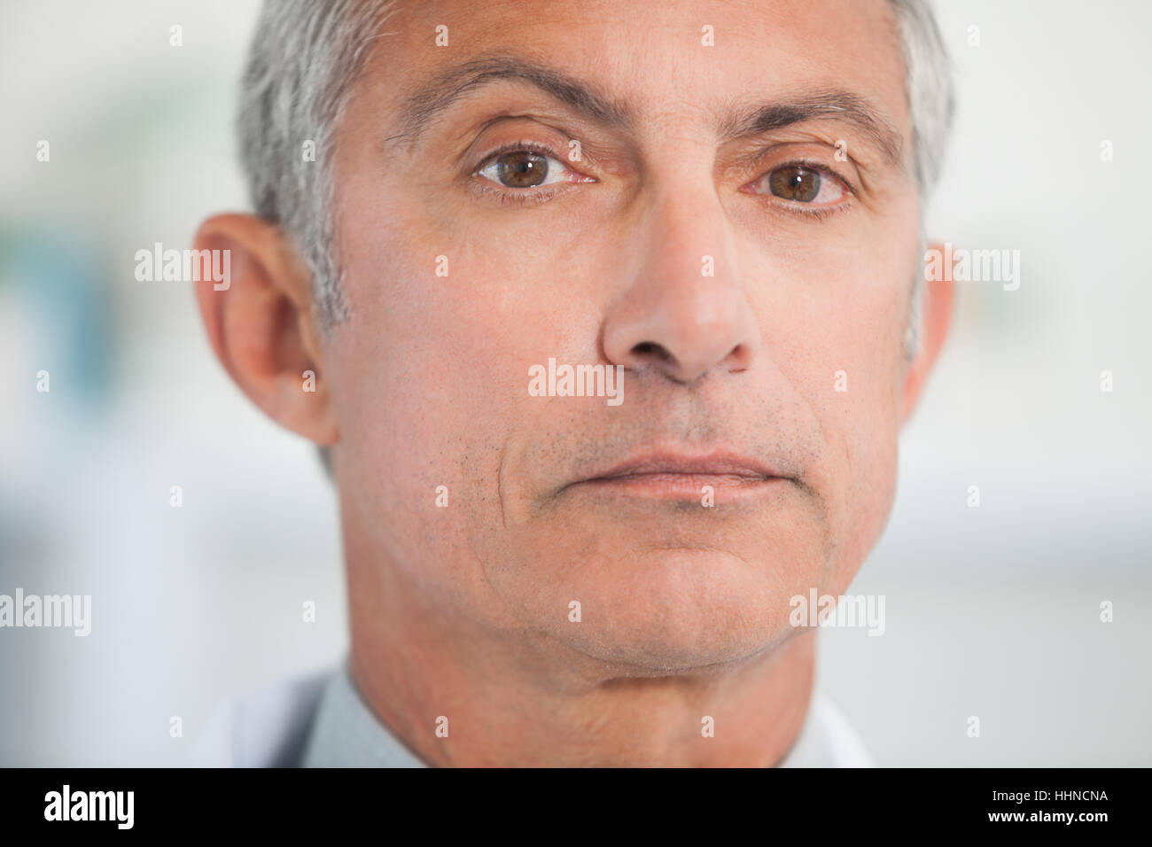 Man is looking angry into the camera Stock Photo - Alamy