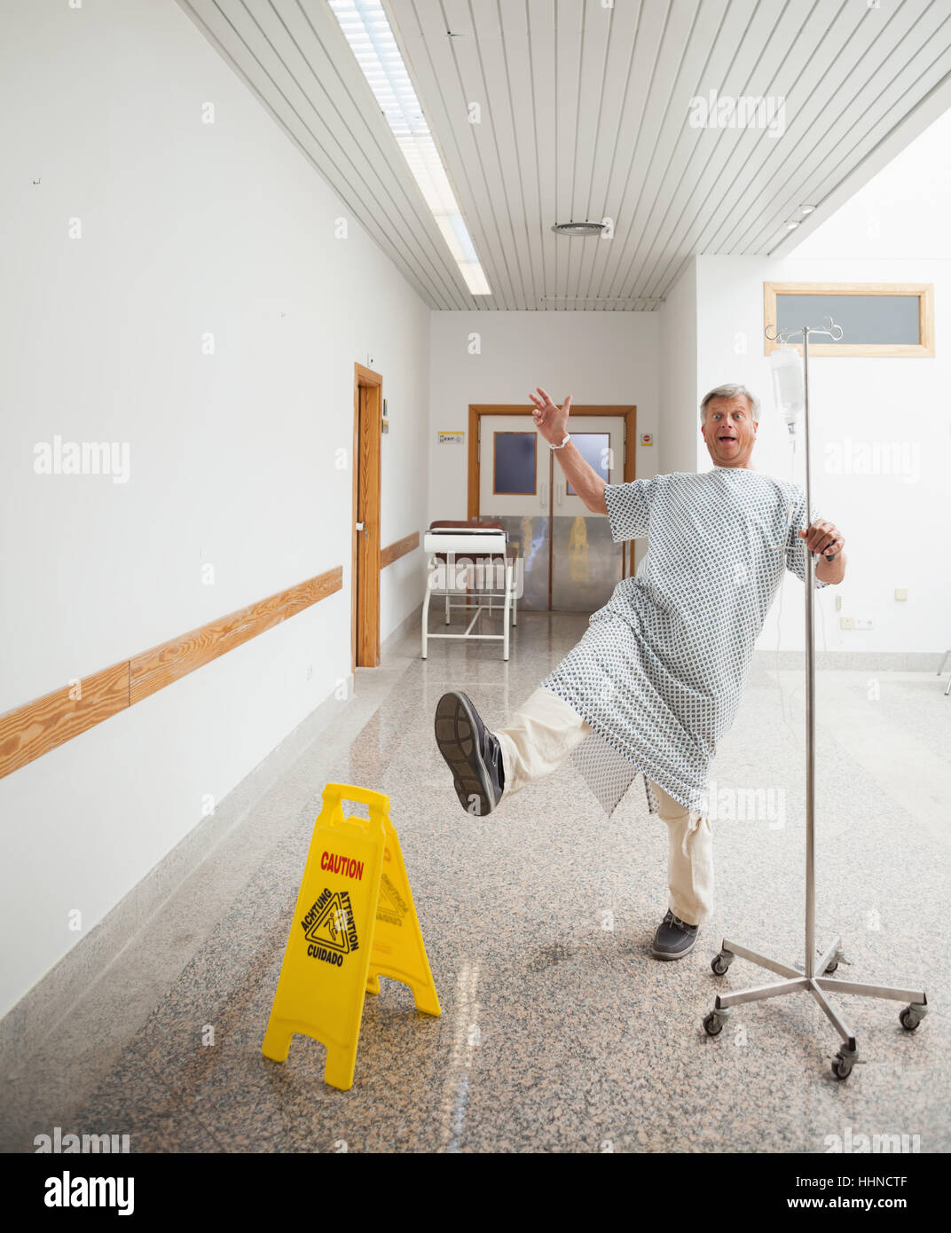 Hospital caution wet floor sign hi-res stock photography and images - Alamy
