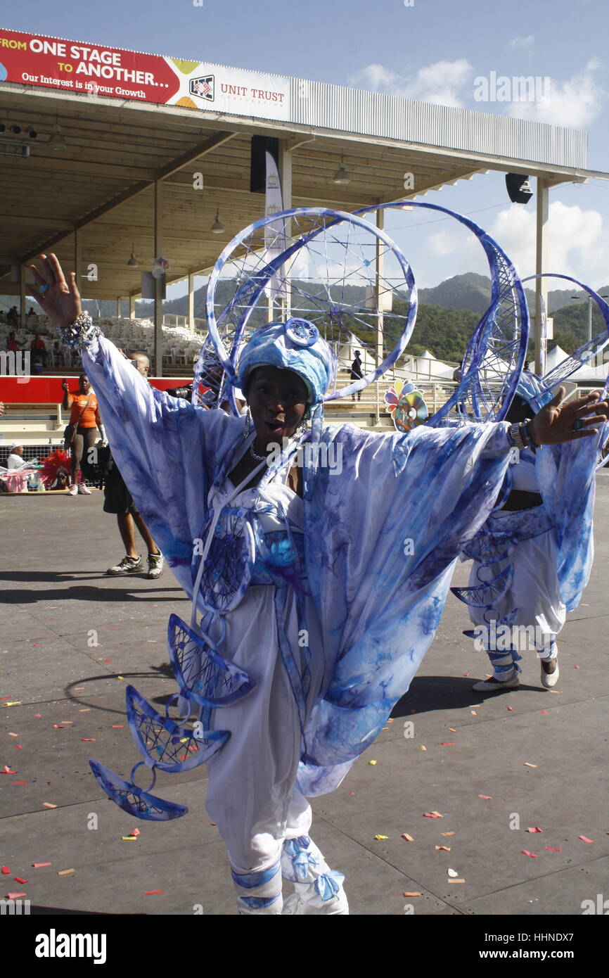 Woman Dancing Carnival in a blue costume at the Queen Park in Trinidad ...