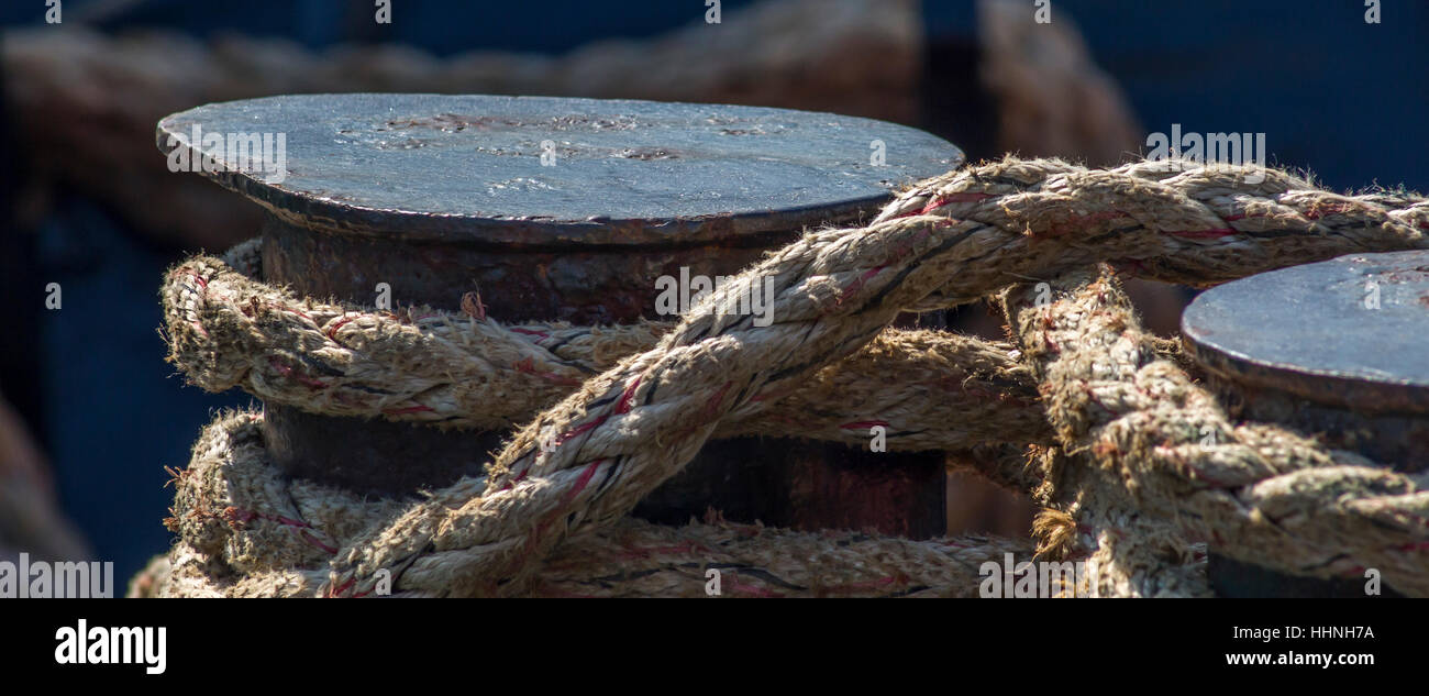 Steel Capstan with rope Stock Photo - Alamy