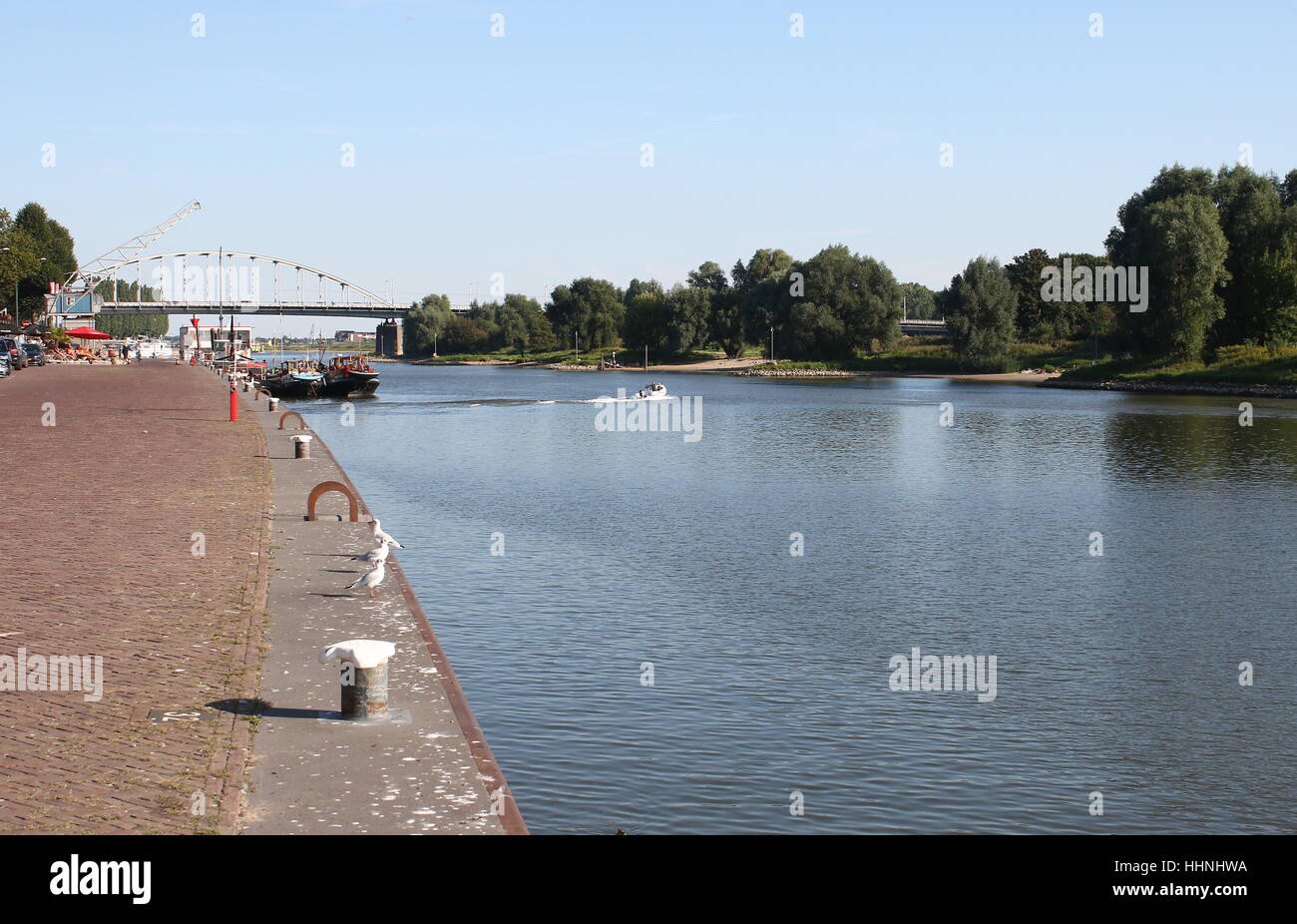 Nederrijn (Nether Rhine) river flowing through central Arnhem at ...