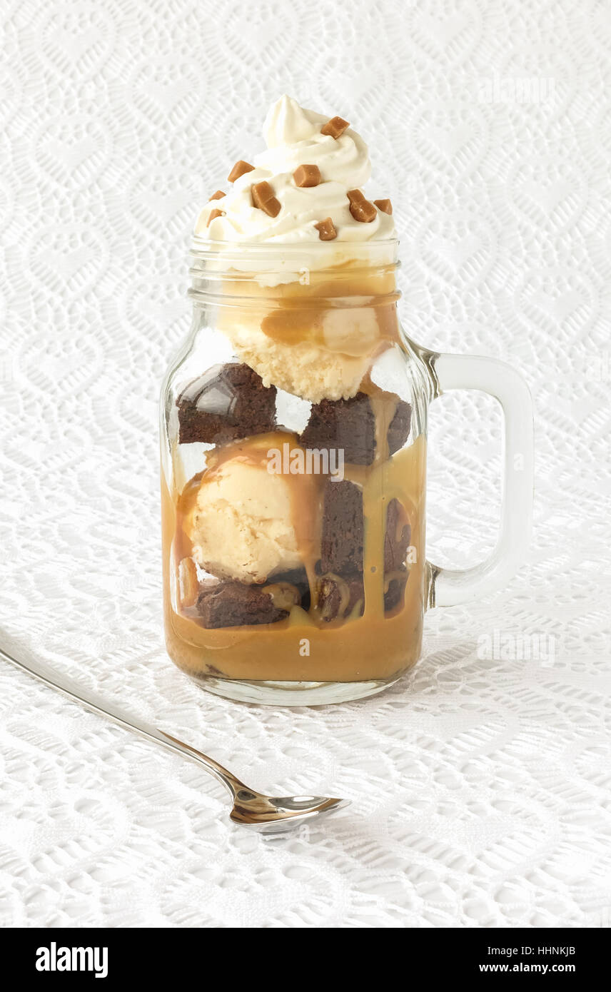 Brownie Ice Cream Sundae in a Mason Jar Stock Photo - Alamy