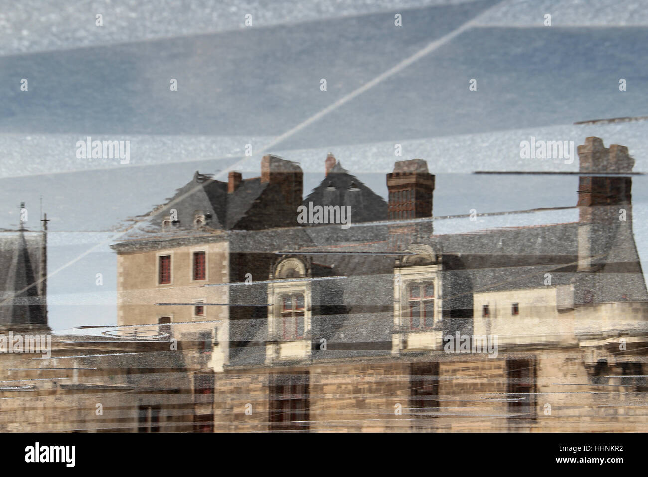 Reflection of a medieval castle in a water mirror in Nantes (France ...