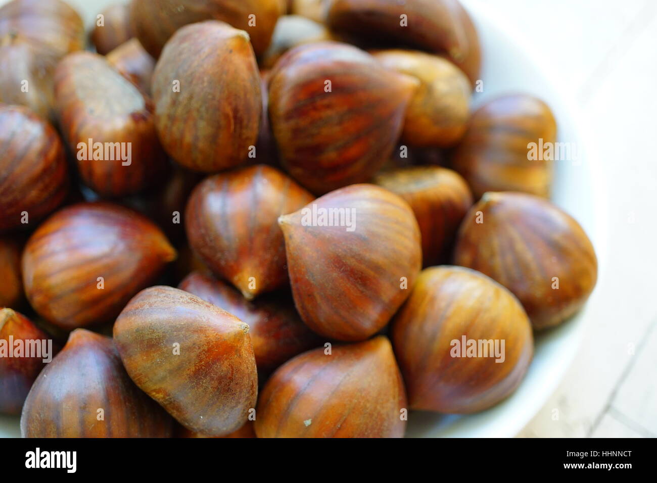 Chestnuts in bowl hi-res stock photography and images - Alamy