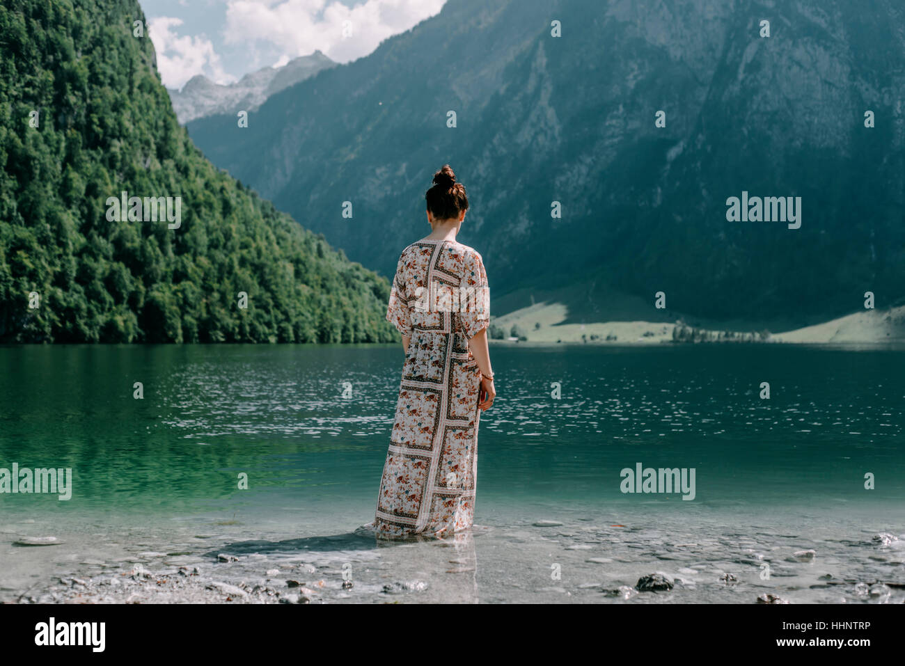 Woman wading lake dress hi-res stock photography and images - Alamy