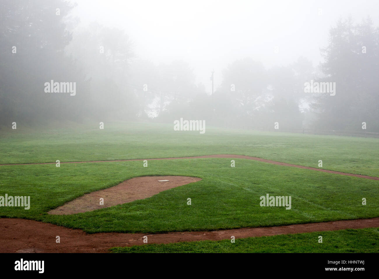 Fog over baseball field Stock Photo - Alamy
