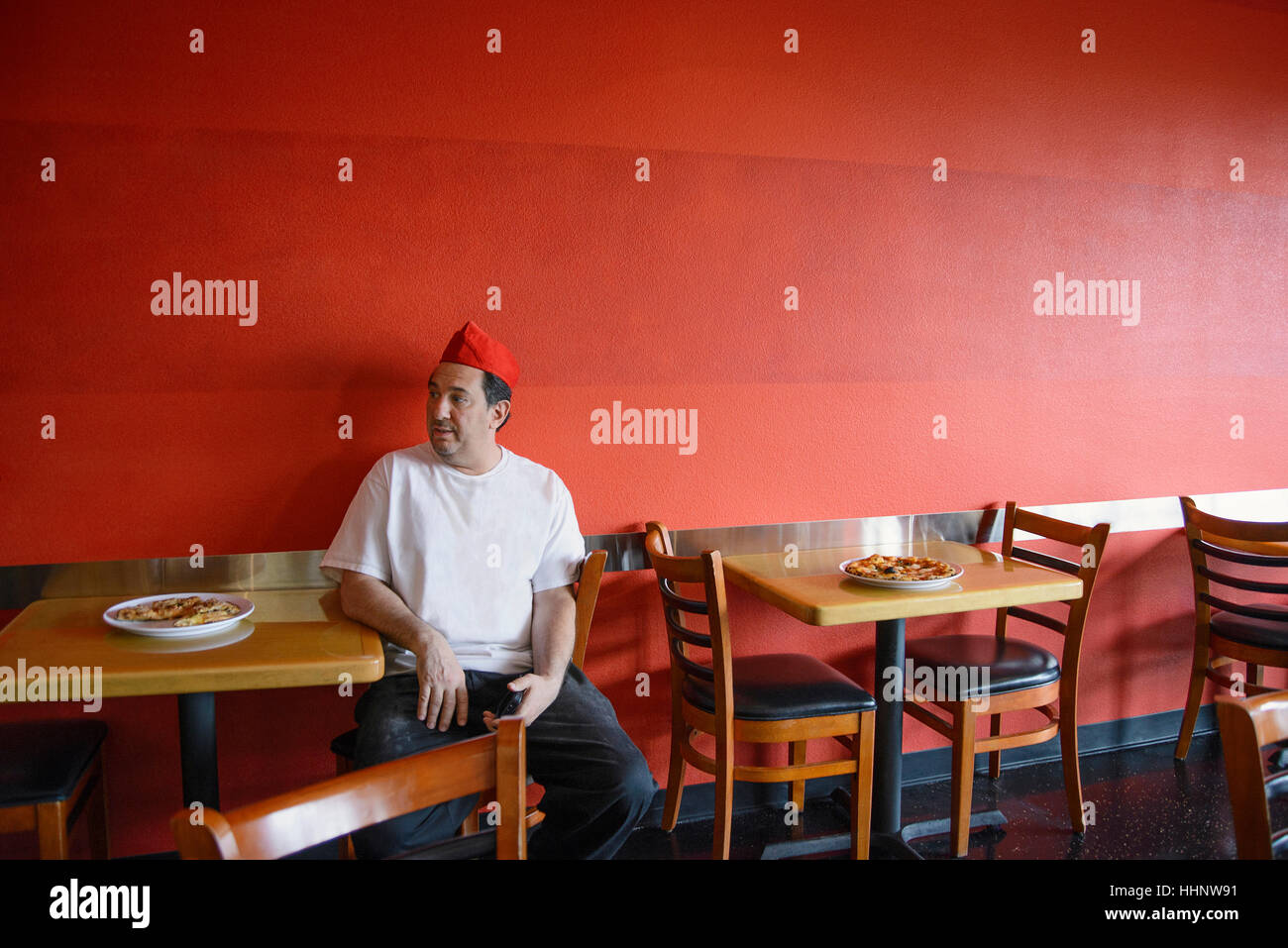 Sitting in the middle of a table hi-res stock photography and images ...