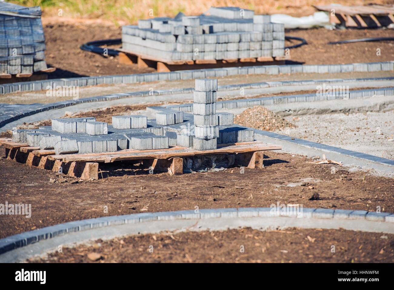 Paving Brick Paths. Pile of Bricks Ready For Paving Stock Photo - Alamy