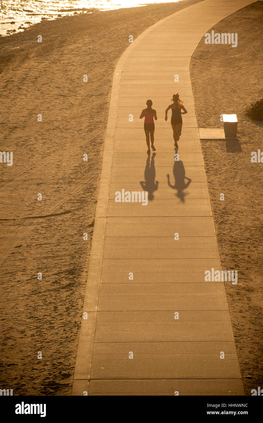 Child running on path rear view hi-res stock photography and images - Alamy