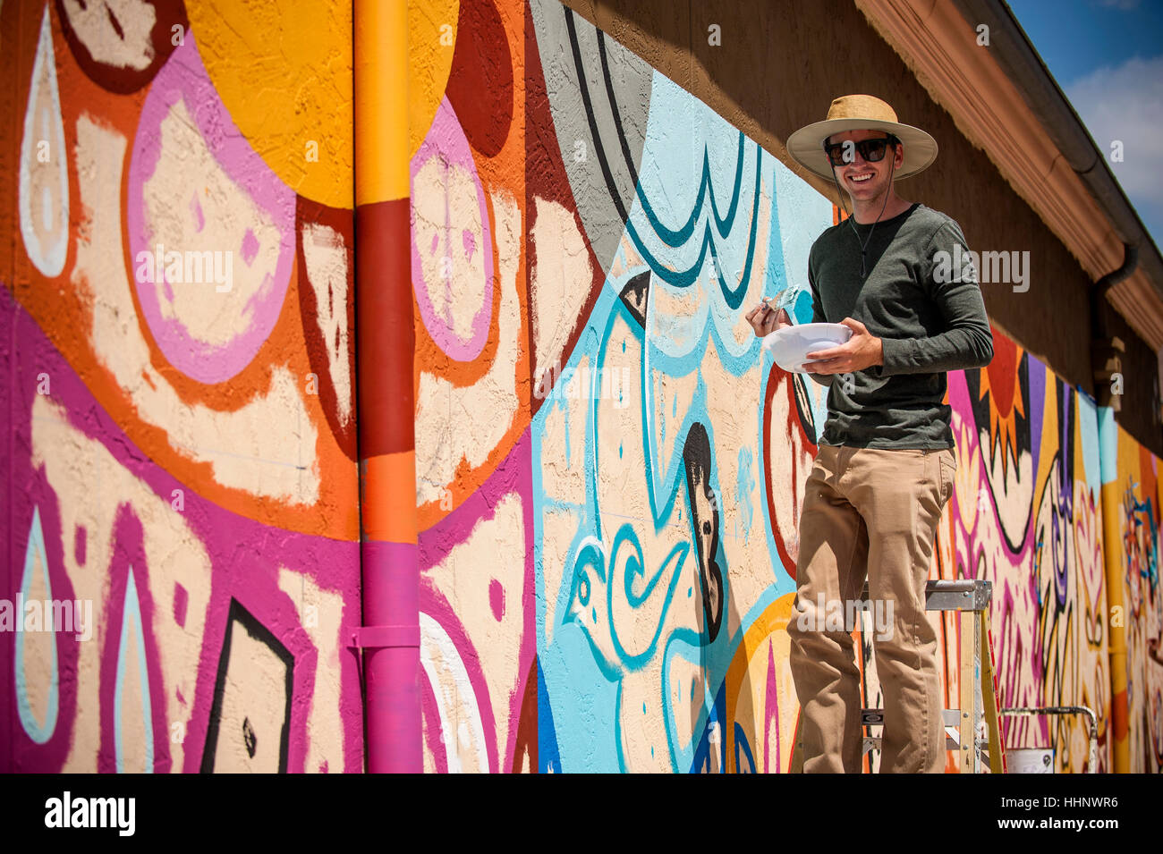 Man painting mural hi-res stock photography and images - Alamy