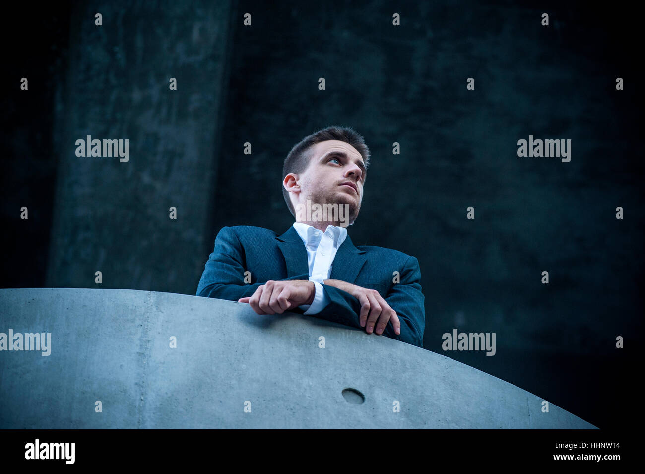 Man leaning on balcony hi-res stock photography and images - Alamy