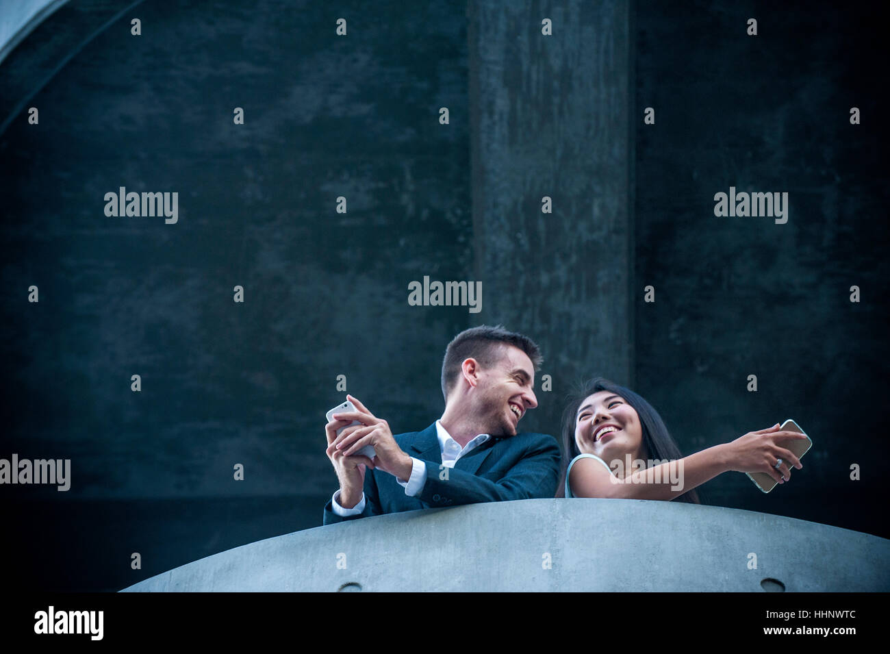 Candid confident couple young low angle hi-res stock photography and ...