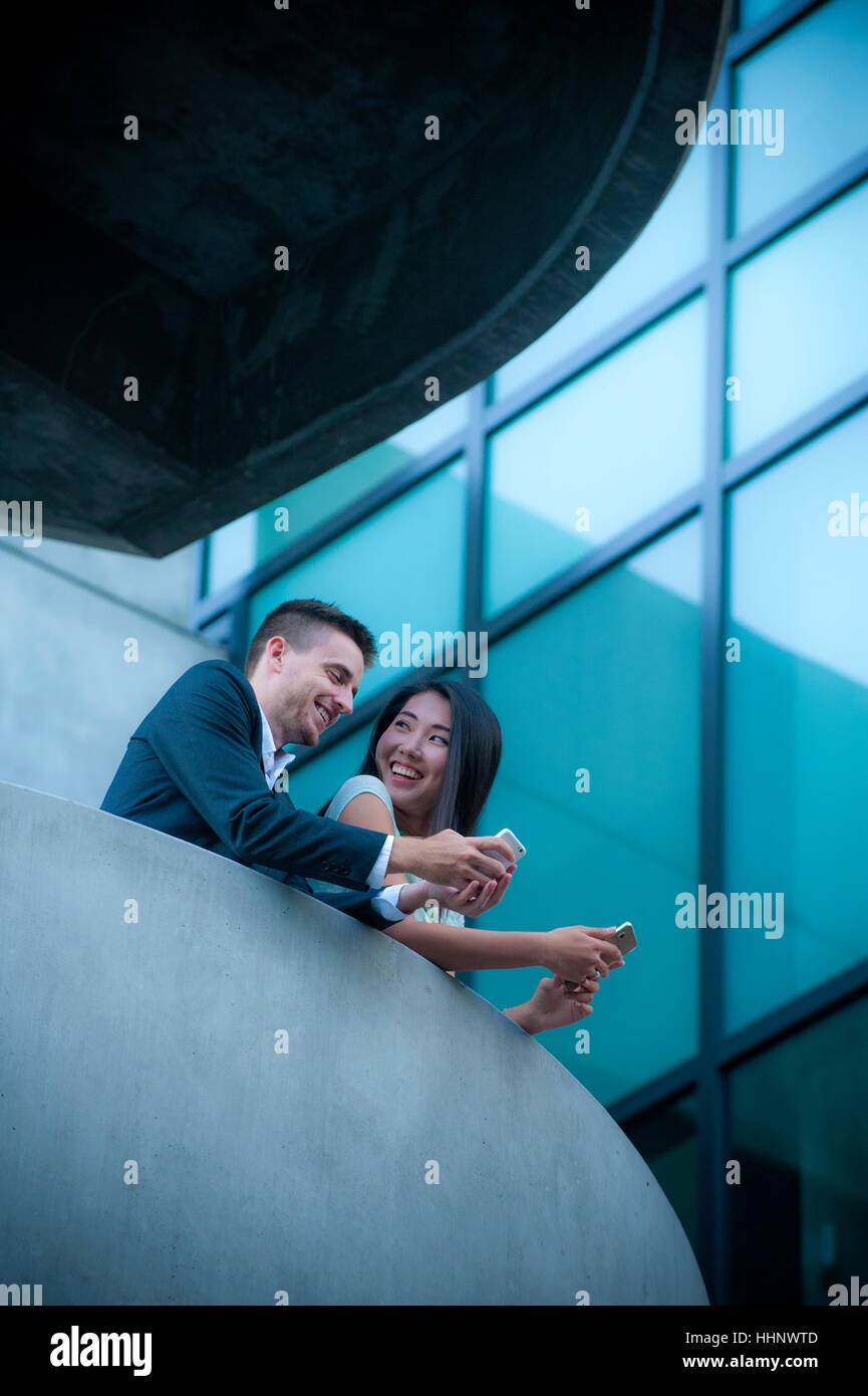 Candid confident couple young low angle hi-res stock photography and ...