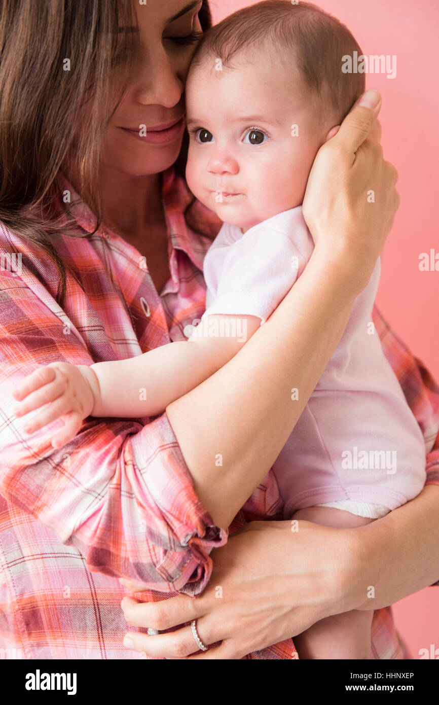 Mother hugging her hi-res stock photography and images - Alamy