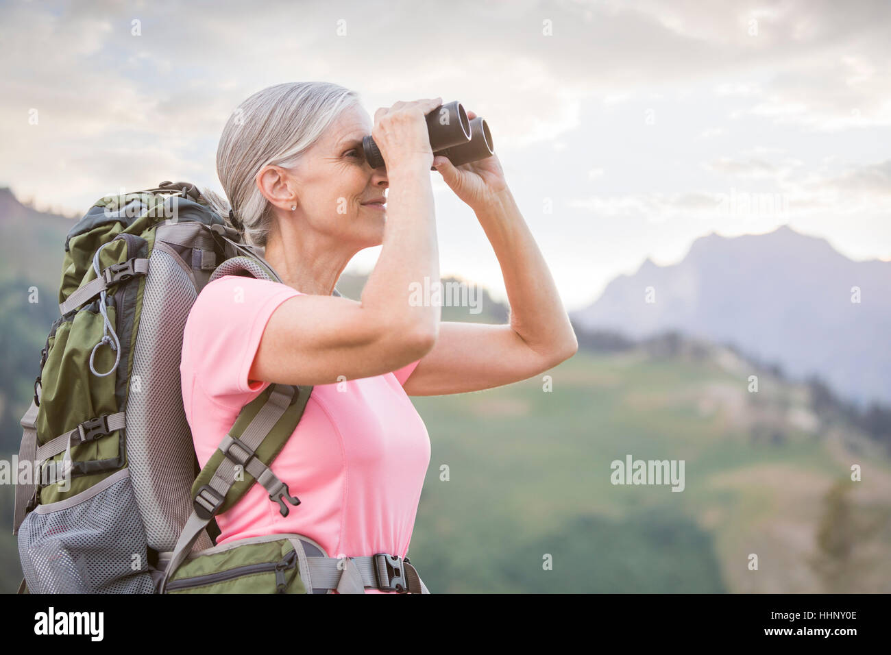 Person using binoculars hi-res stock photography and images - Alamy