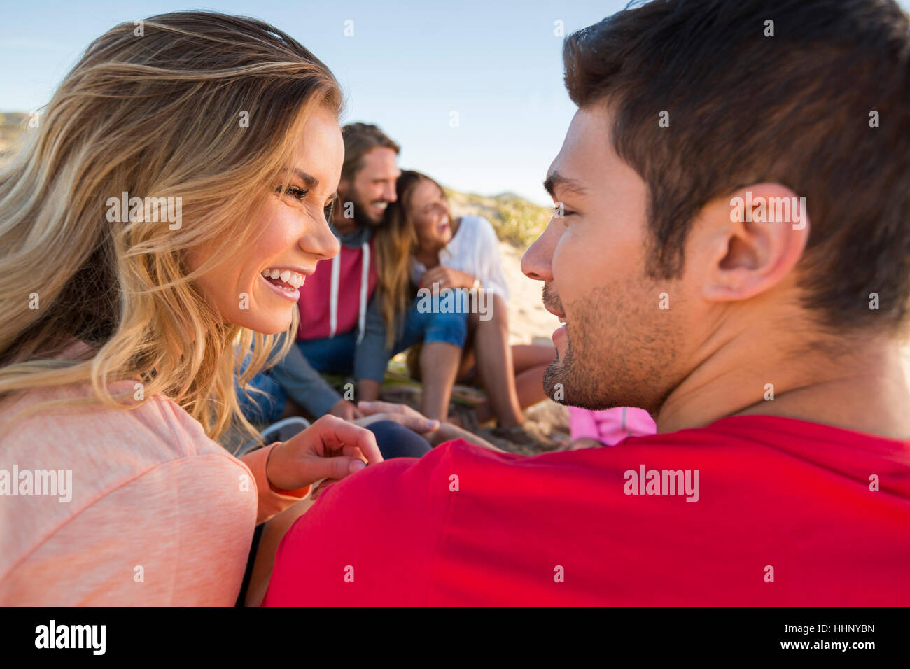 Beautiful smiling couple listening hi-res stock photography and images ...