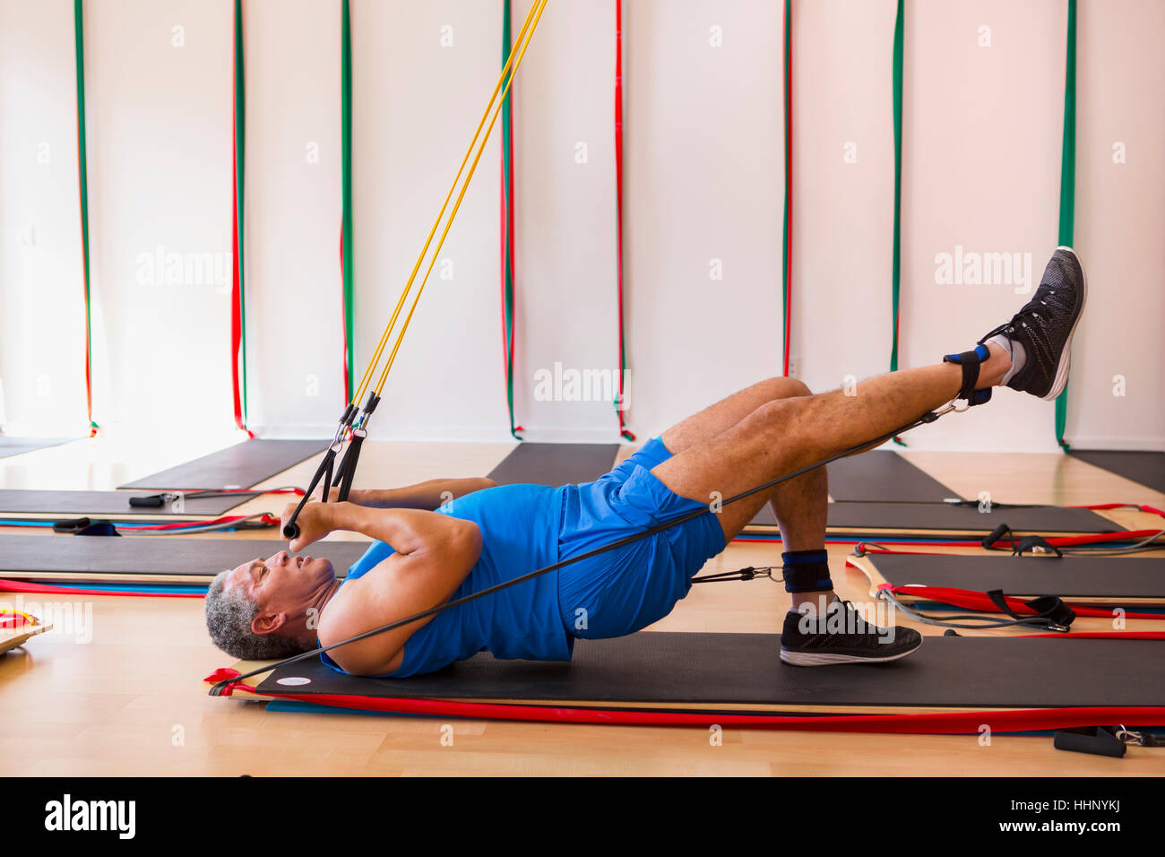 Resistance band man exercise hi-res stock photography and images - Alamy