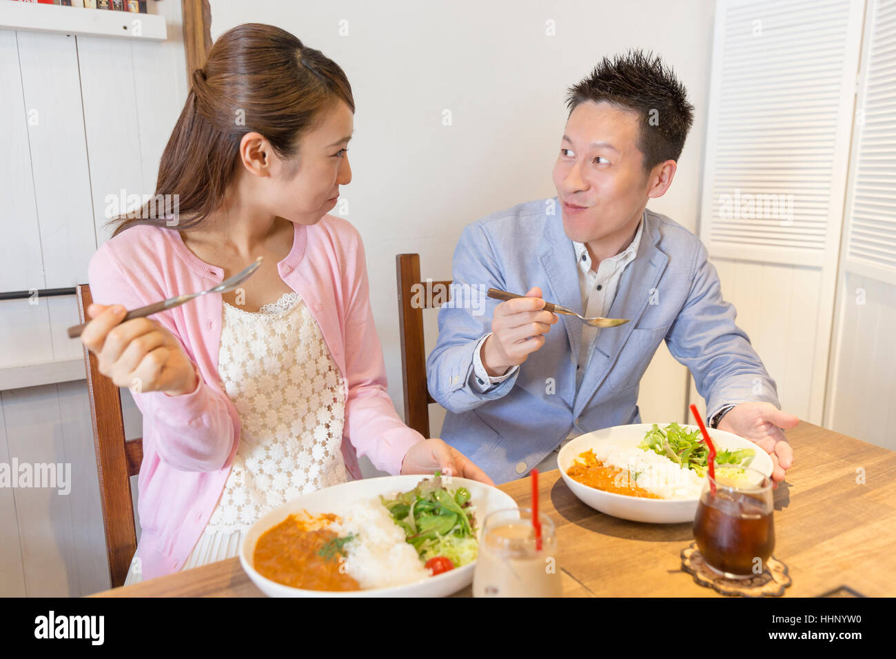 Couple Having Meals Together Stock Photo - Alamy
