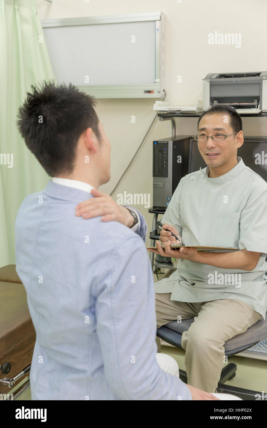 Man Seeing Doctor Stock Photo - Alamy