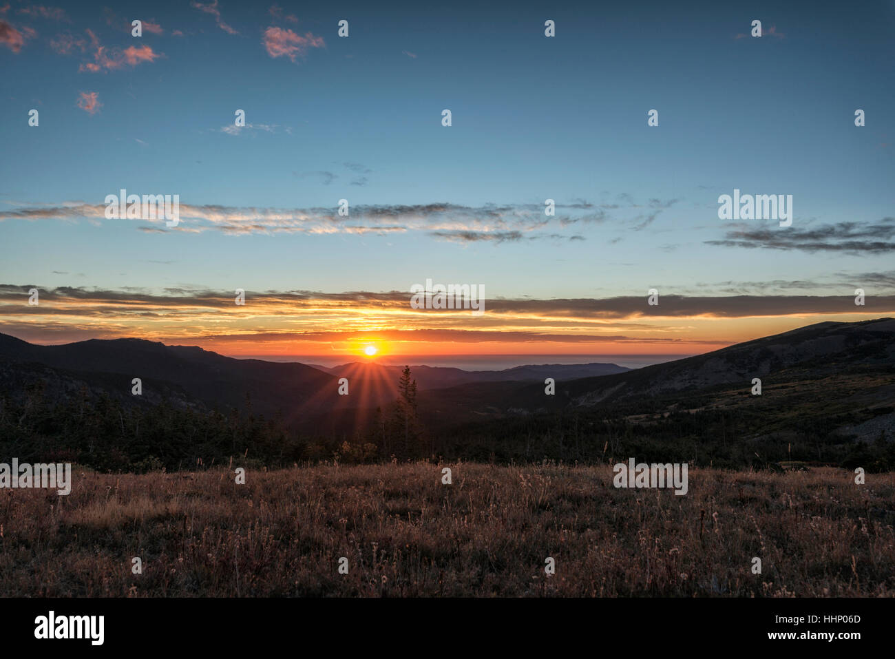 Sunset on mountain landscape Stock Photo - Alamy