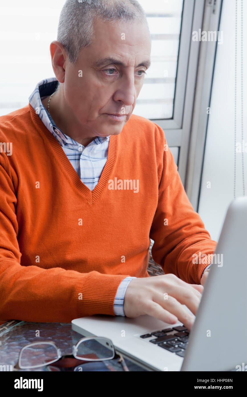 Hispanic man laptop hi-res stock photography and images - Alamy