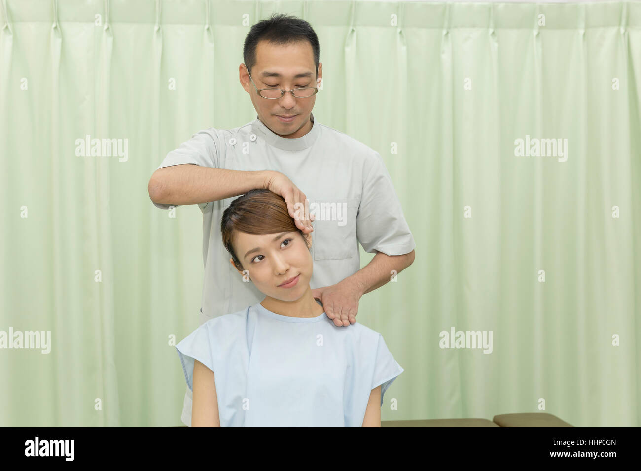 Neck Manipulation High Resolution Stock Photography and Images - Alamy