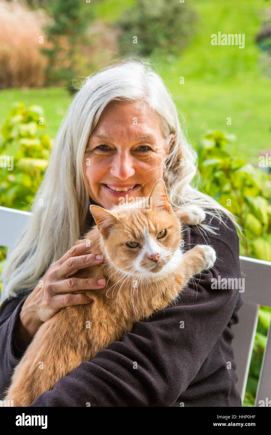 Person holding cat hi-res stock photography and images - Alamy