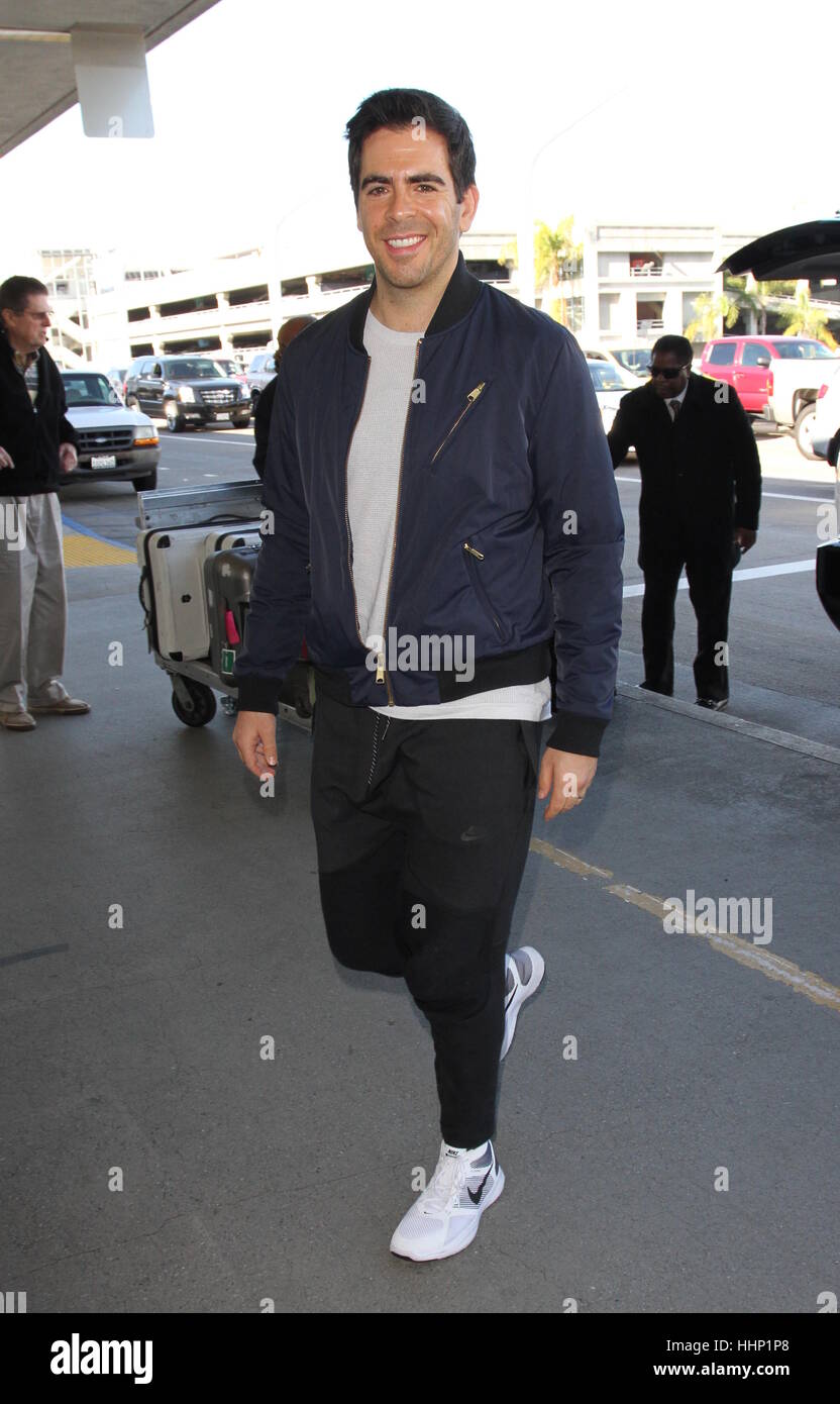Eli Roth and his wife Lorenza Izzo arrive at Los Angeles International ...