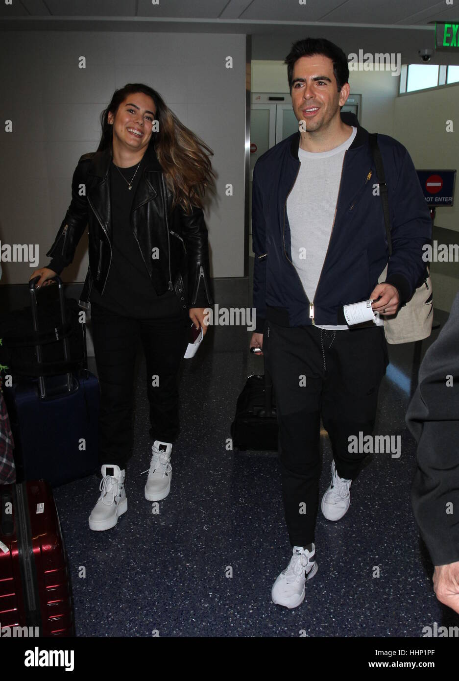 Eli Roth and his wife Lorenza Izzo arrive at Los Angeles International ...