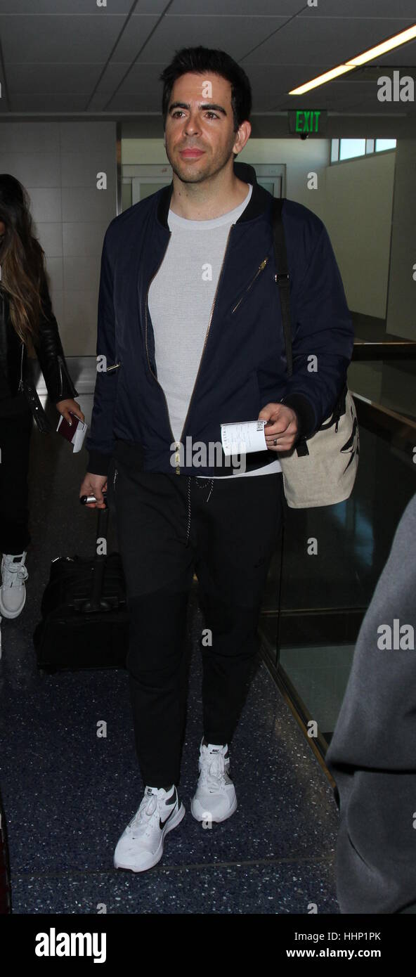 Eli Roth and his wife Lorenza Izzo arrive at Los Angeles International ...