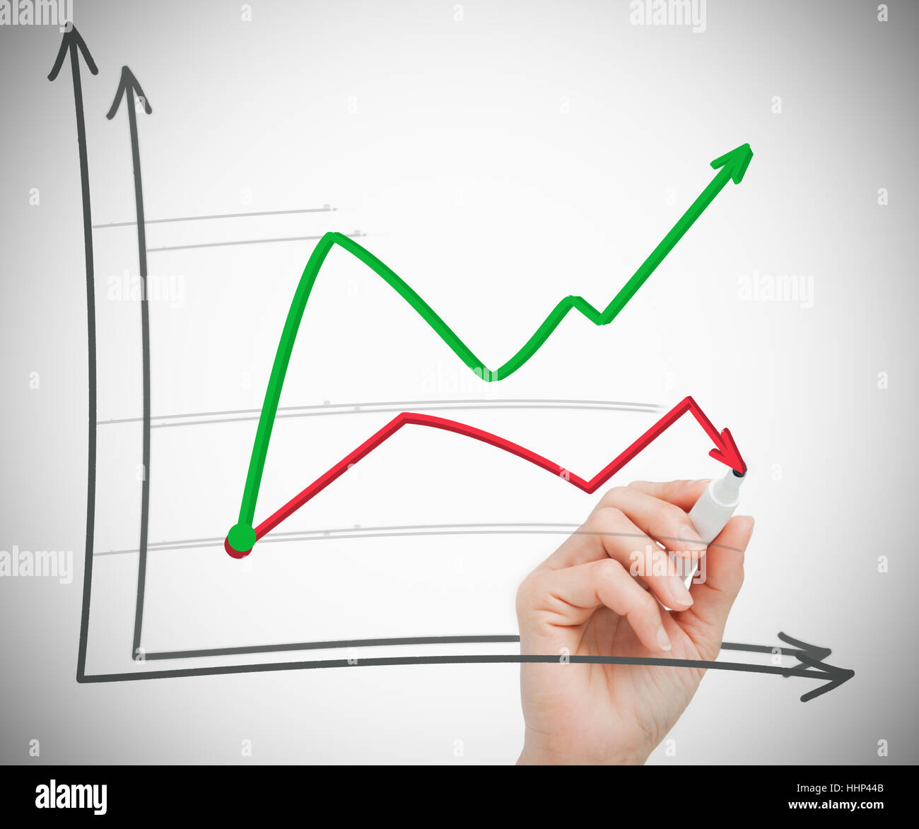 Drawing a chart with a pen on grey background Stock Photo - Alamy
