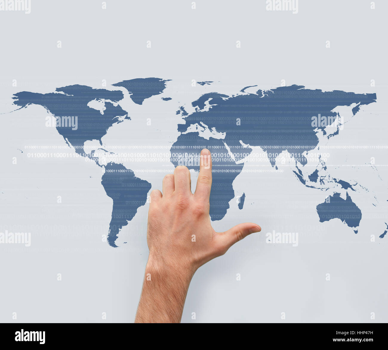 Hand pointing on digital world map Stock Photo - Alamy