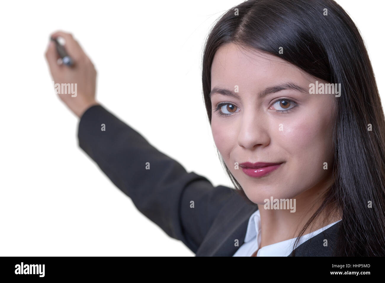 business woman with a marker pen writing something behind her Stock ...