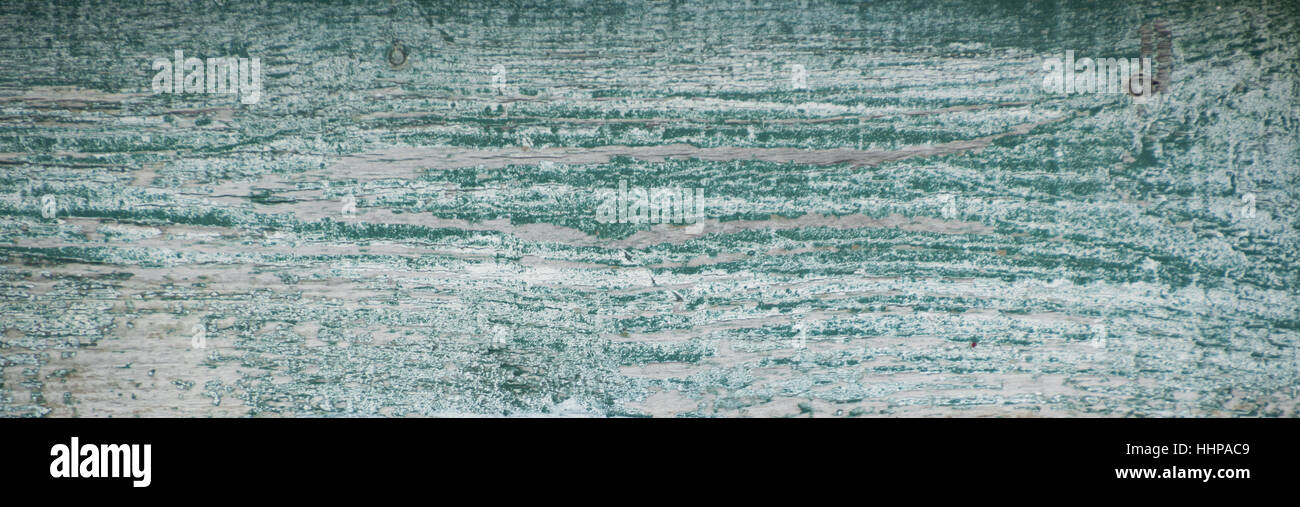 Worn white weathered painted plank with green underneath Stock Photo ...