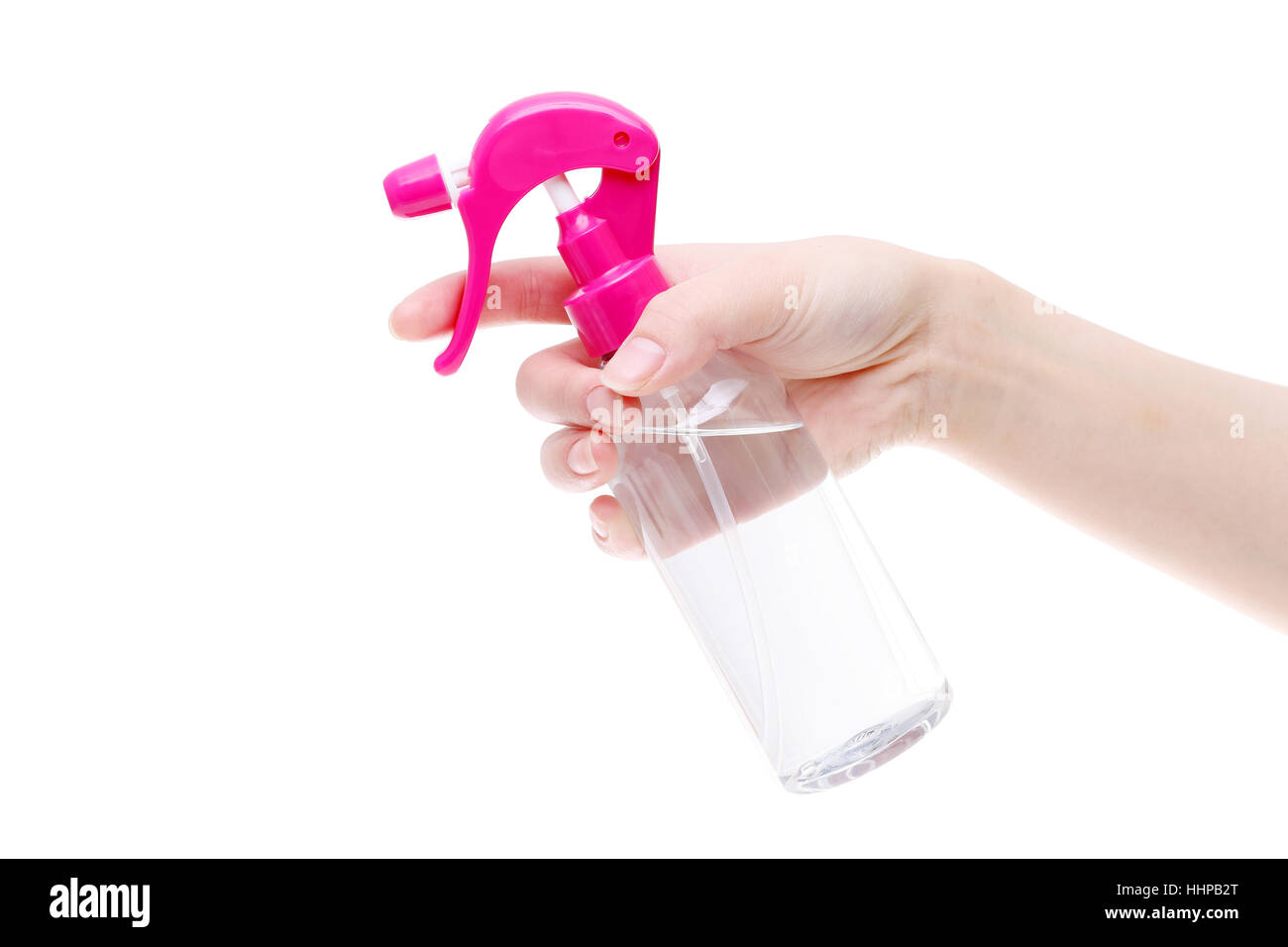 Hand holding spray perfume plastic bottle on white background Stock ...