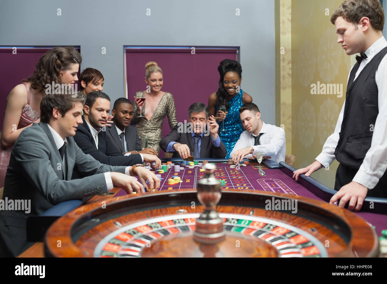 Placing bet on roulette table hi-res stock photography and images - Alamy