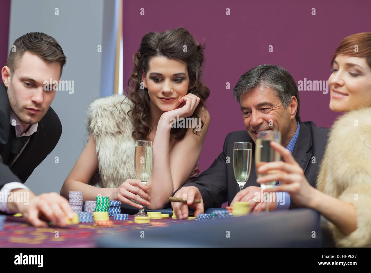Man placing bet roulette table hi-res stock photography and images - Alamy