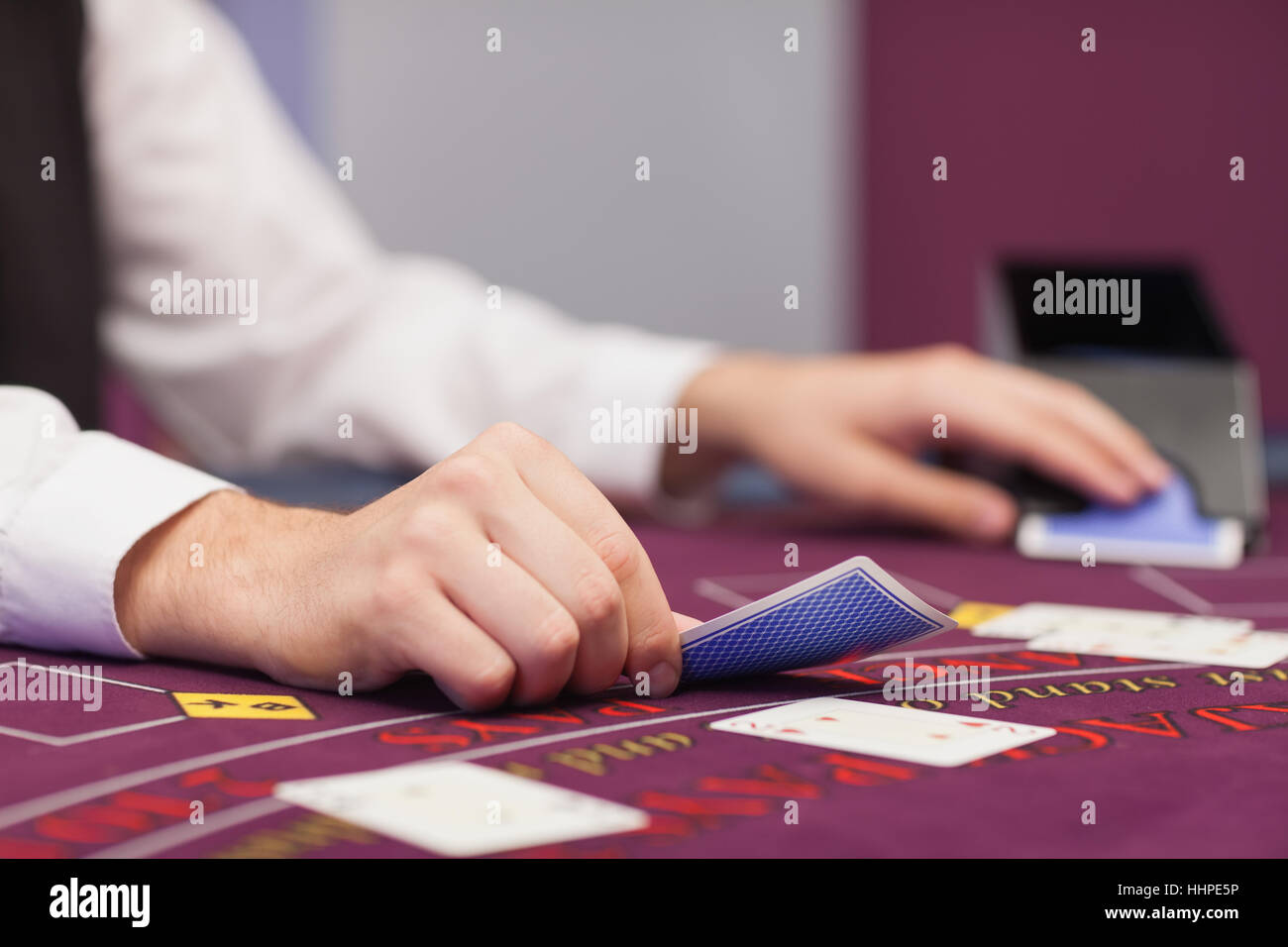Croupier dealing cards hi-res stock photography and images - Alamy