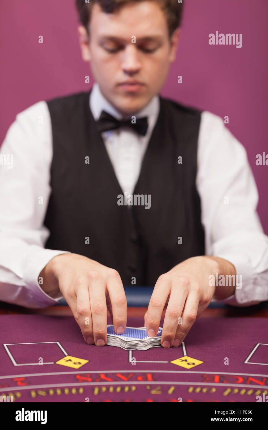 Croupier shuffling cards hi-res stock photography and images - Alamy