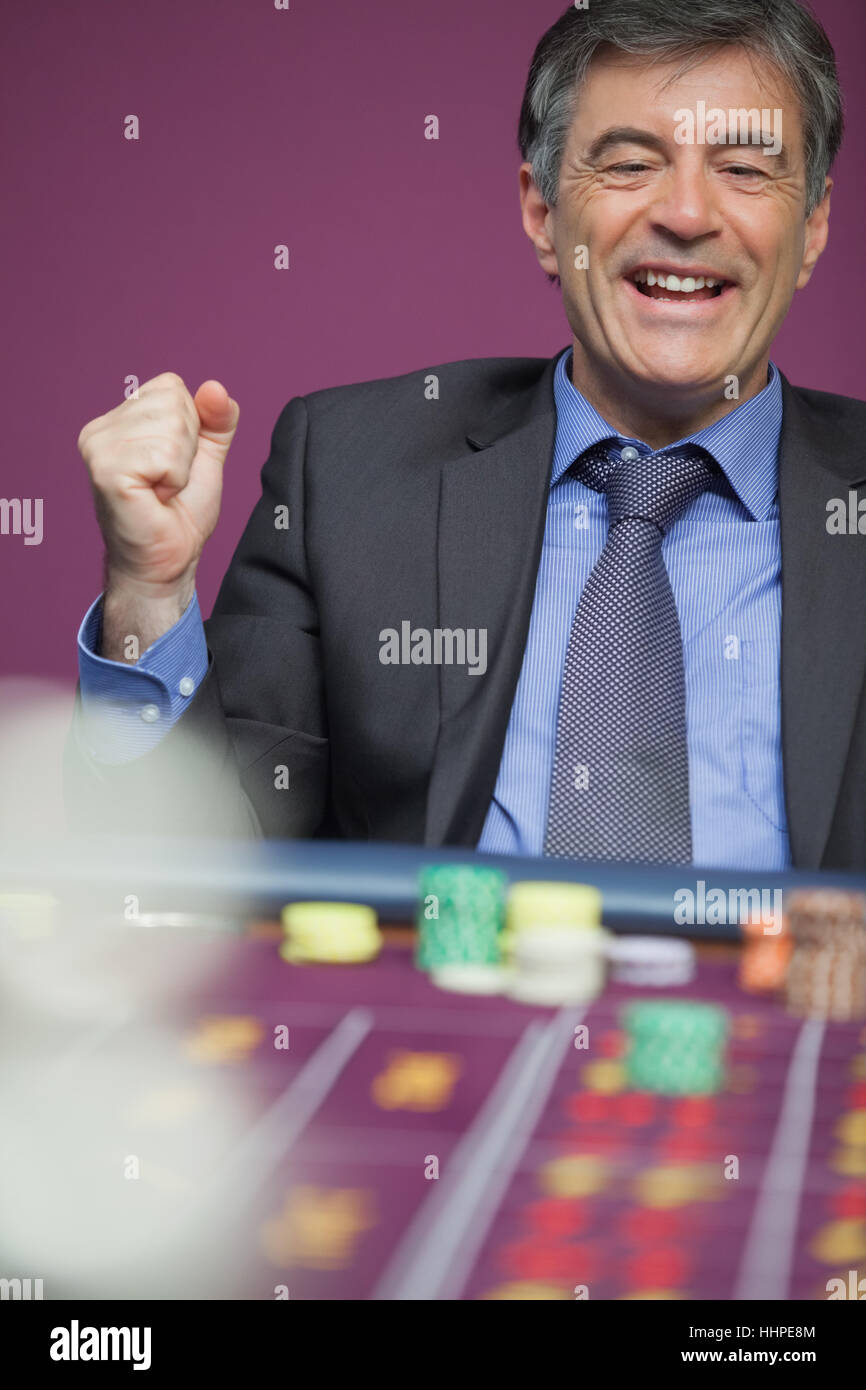 Man placing bet roulette table hi-res stock photography and images - Alamy