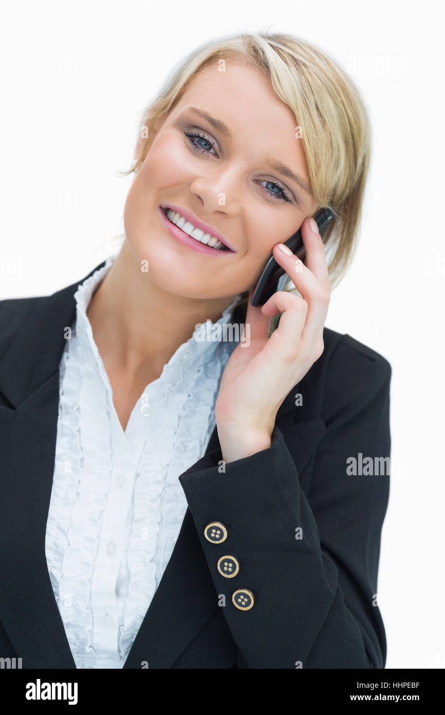 Smiling blonde business woman calling Stock Photo - Alamy