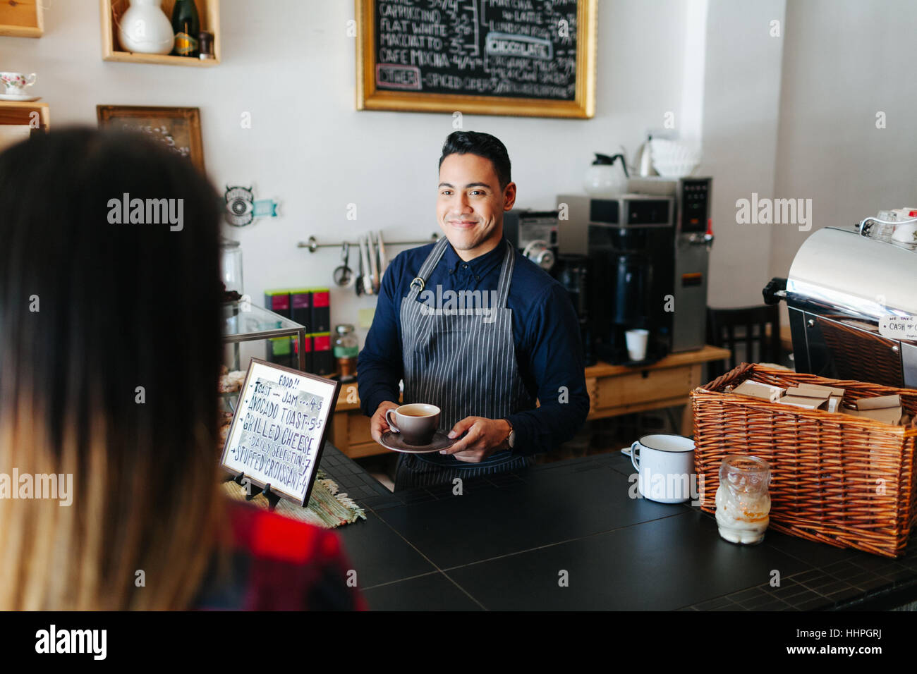 Ordering a coffee at the counter hi-res stock photography and images ...