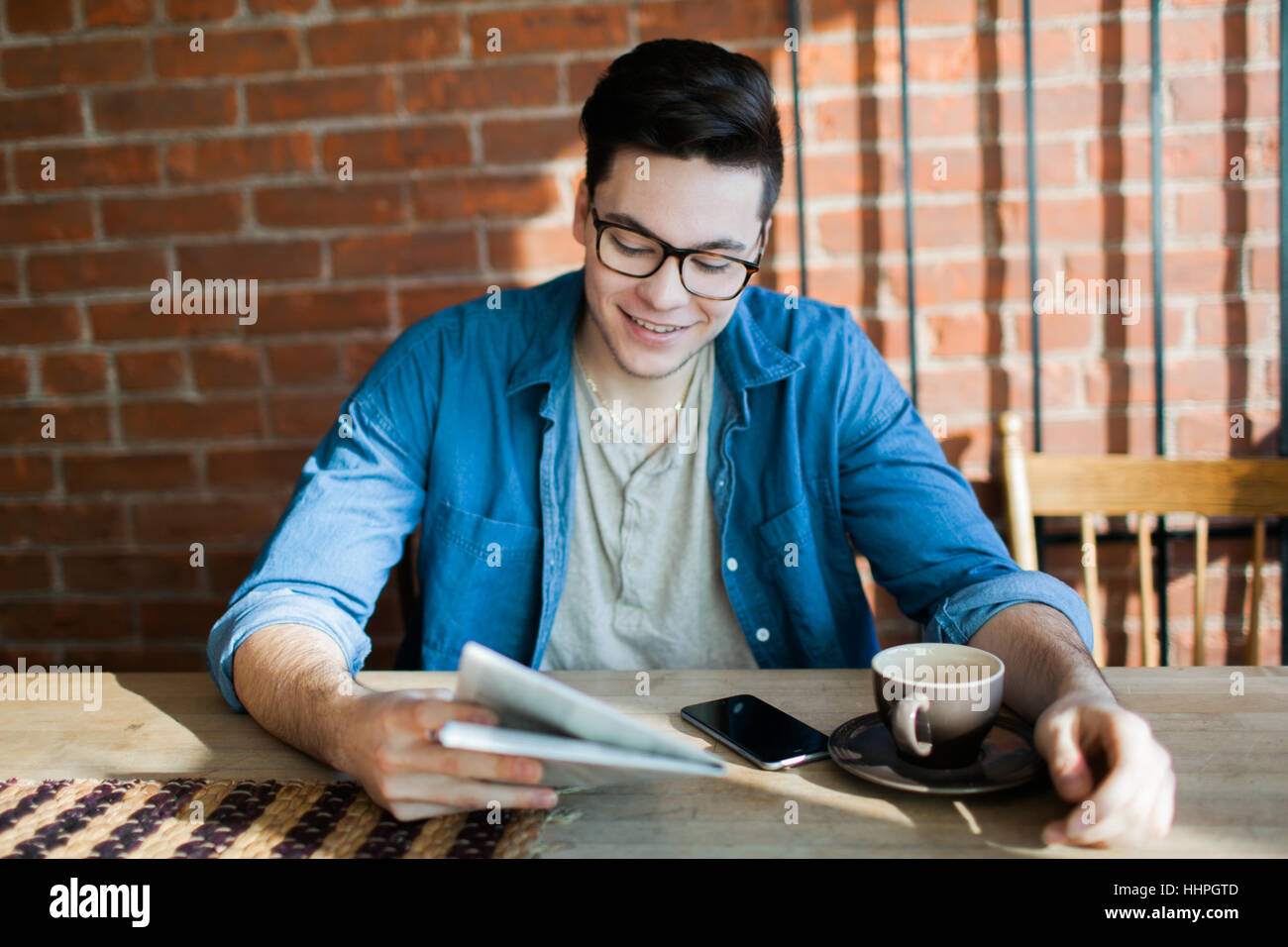Shadow man sitting table hi-res stock photography and images - Alamy