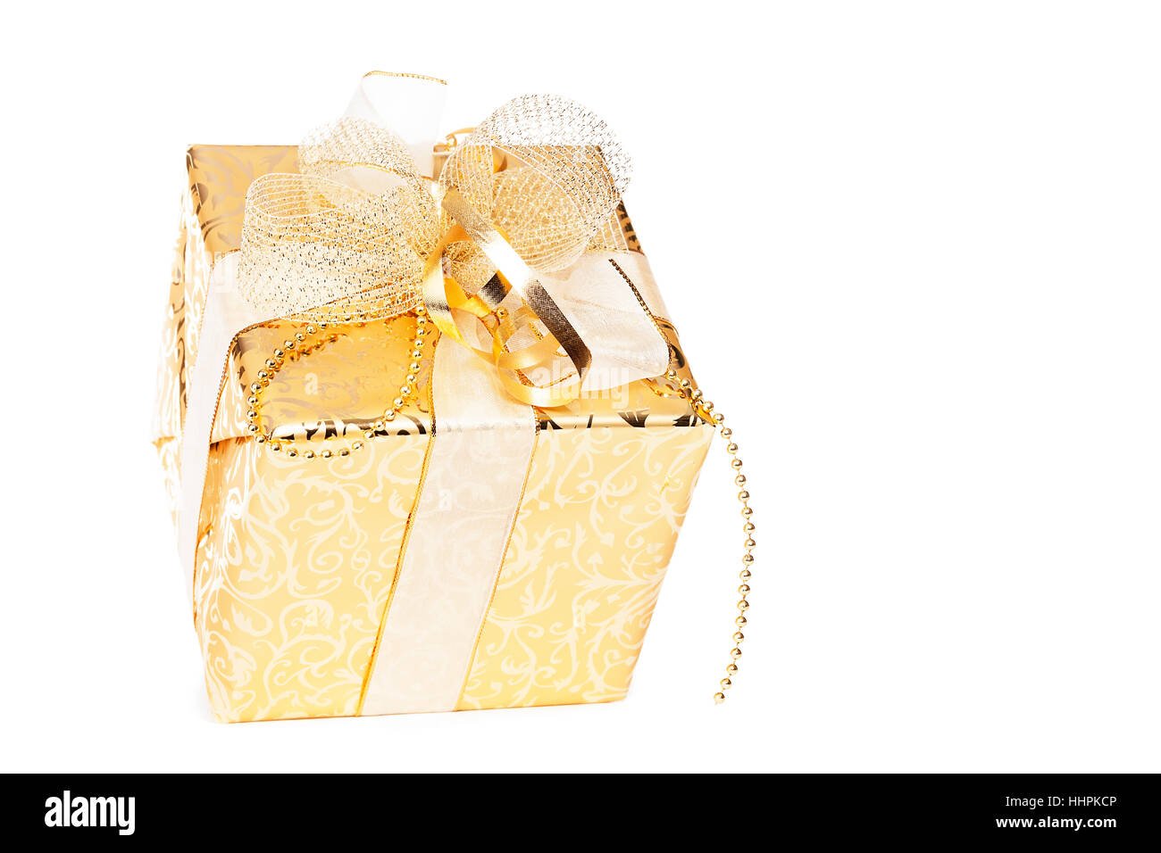 golden christmas gift Stock Photo - Alamy