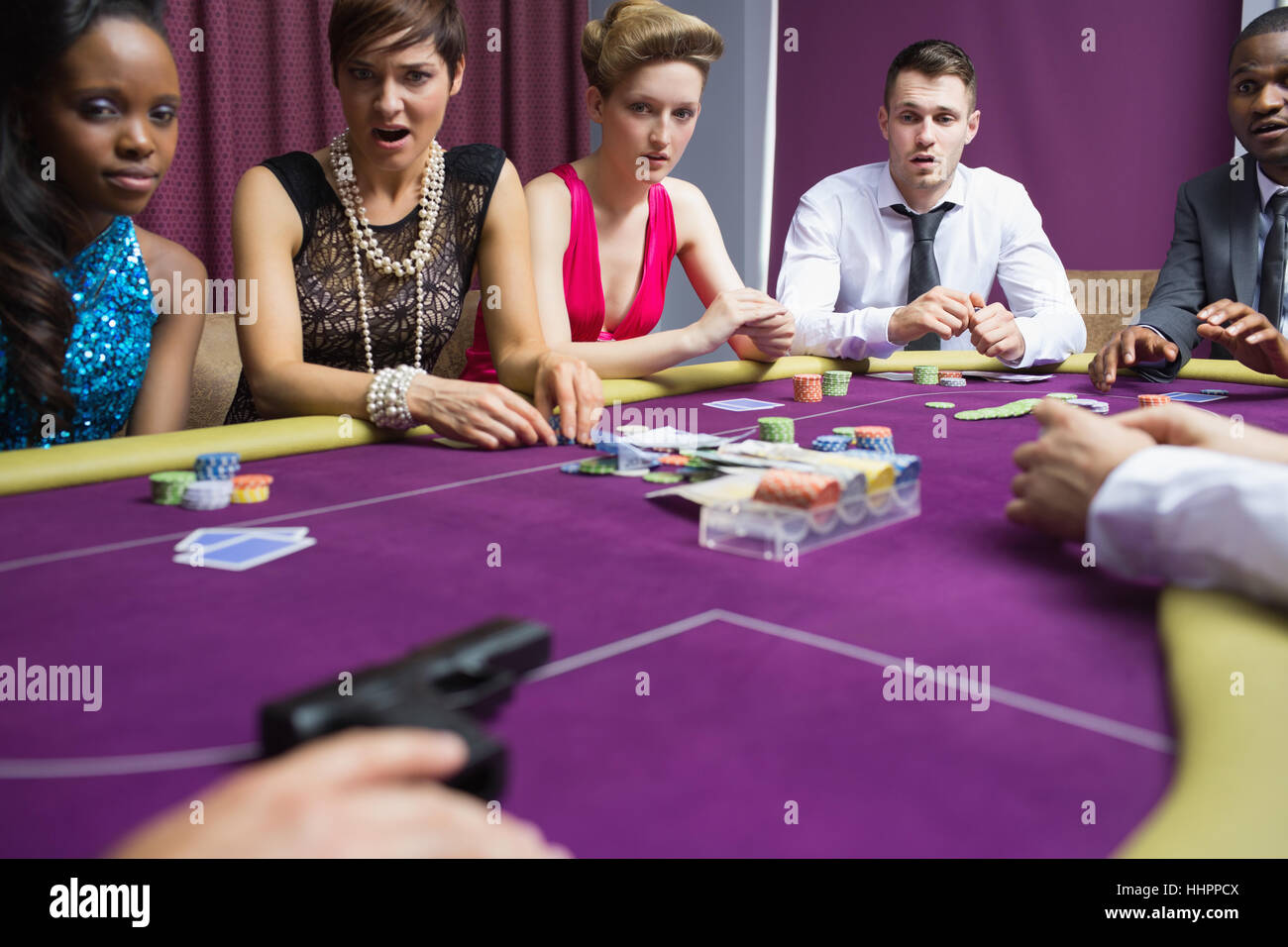 Man gun poker table in hi-res stock photography and images - Alamy