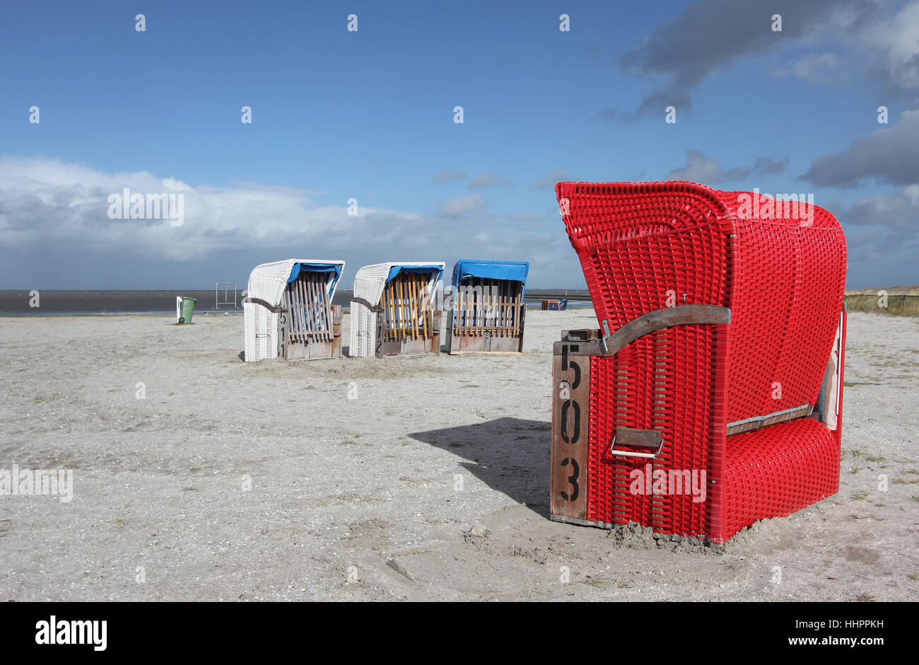 red beach chair at the north sea Stock Photo - Alamy