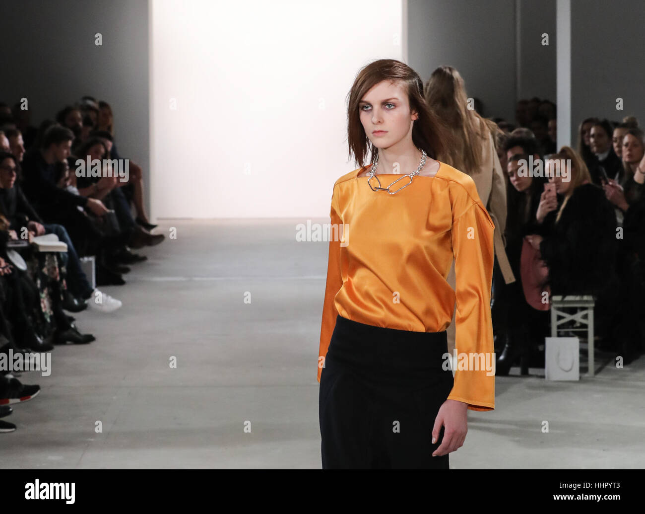 Berlin, Germany. 19th Jan, 2017. A model displays a creation of German ...