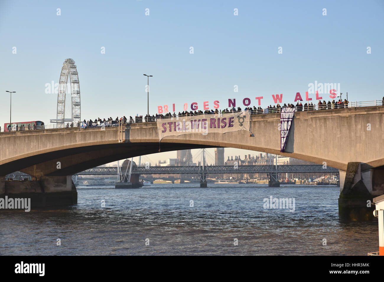 Waterloo Bridge, London, UK. 20th Jan, 2017. Womens group hang banners ...
