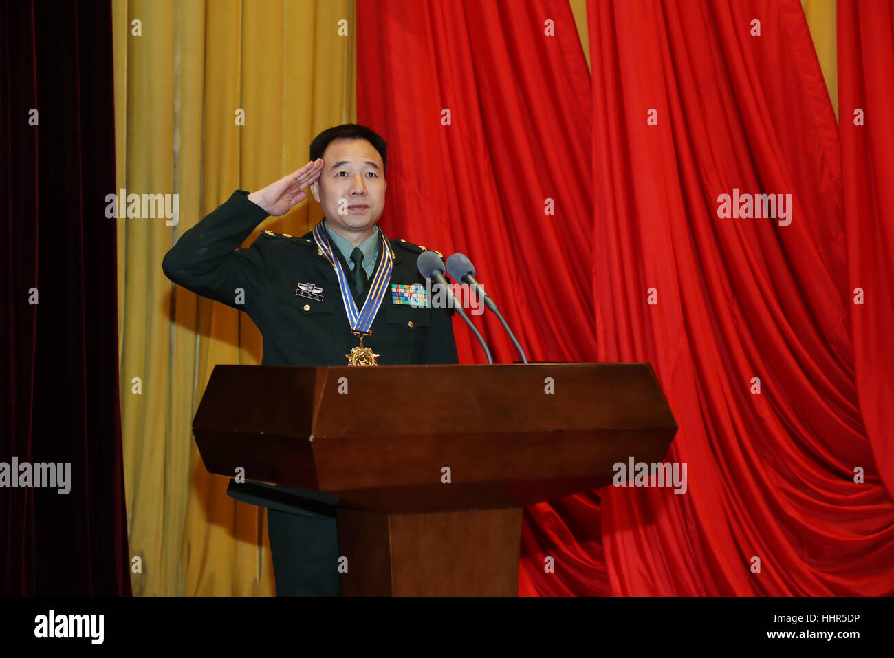 Beijing, China. 20th Jan, 2017. Astronaut Jing Haipeng salutes during a ...