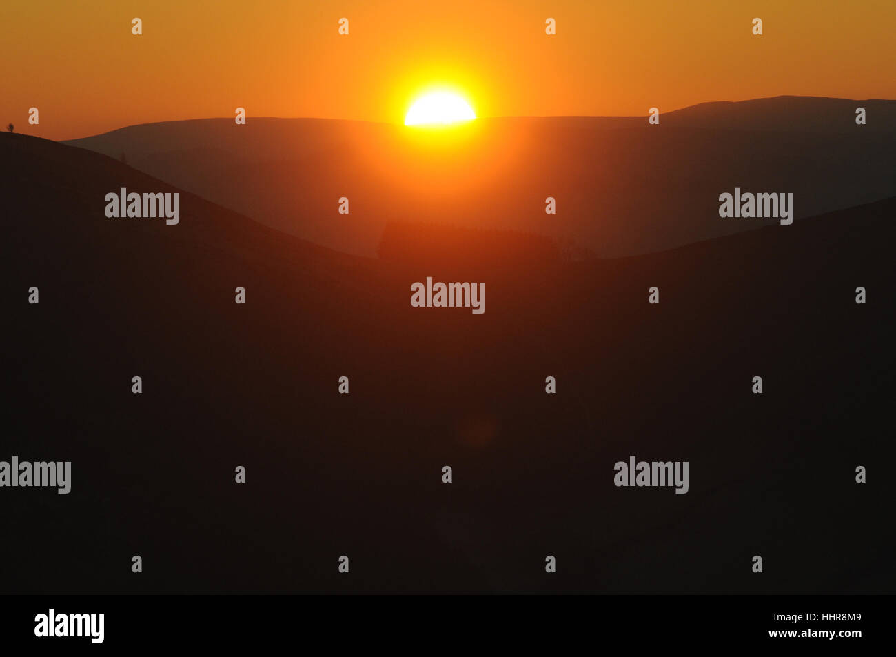 Powys, Wales, UK. 20th Jan, 2017. The sun sets after a cold day looking ...